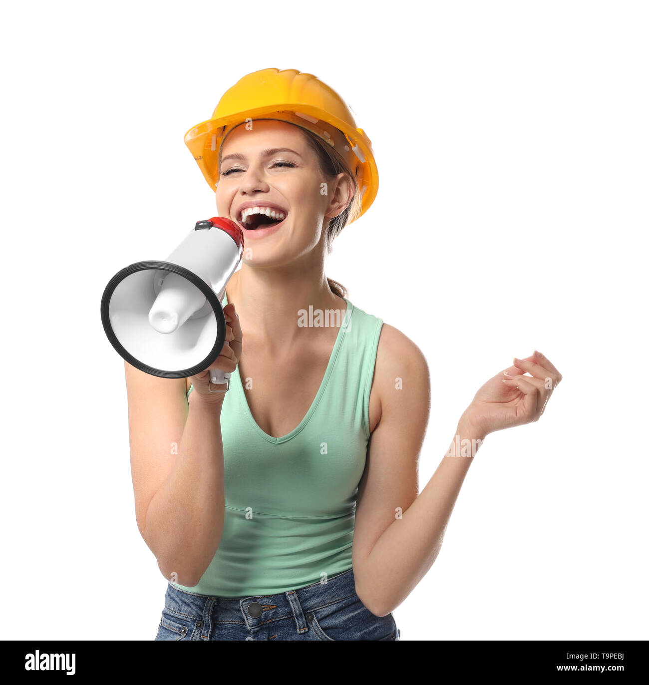 Female engineer with megaphone on white background Stock Photo - Alamy