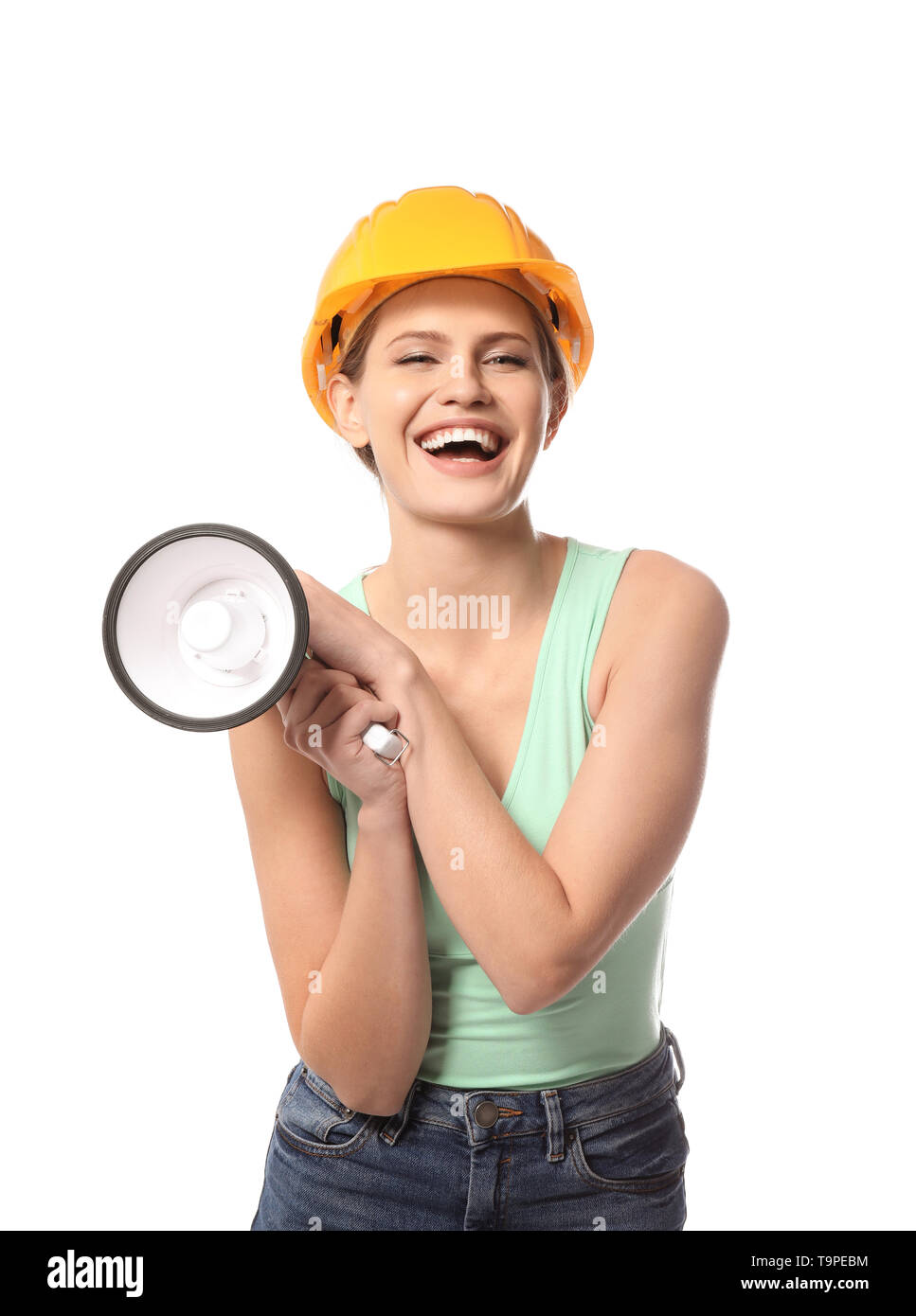Female engineer with megaphone on white background Stock Photo - Alamy