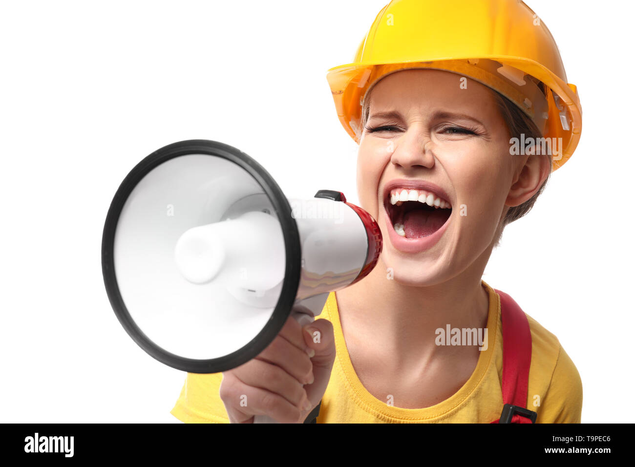 Female engineer with megaphone on white background Stock Photo - Alamy