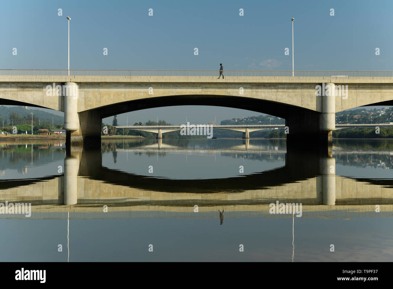 Durban, KwaZulu-Natal, South Africa, single adult man walking on M4 ...