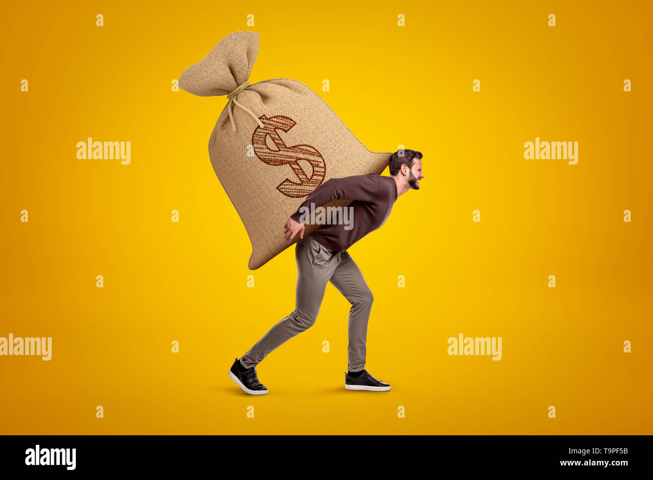 Man carrying bag money hi-res stock photography and images - Alamy