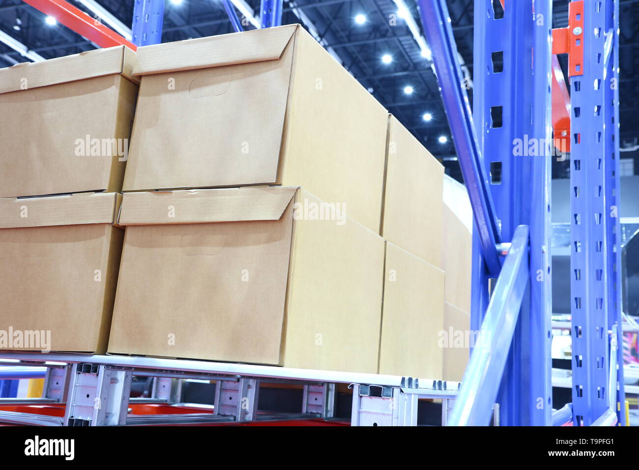 row of cotton boxes kept in warehouse shelves ; logistics Stock Photo ...