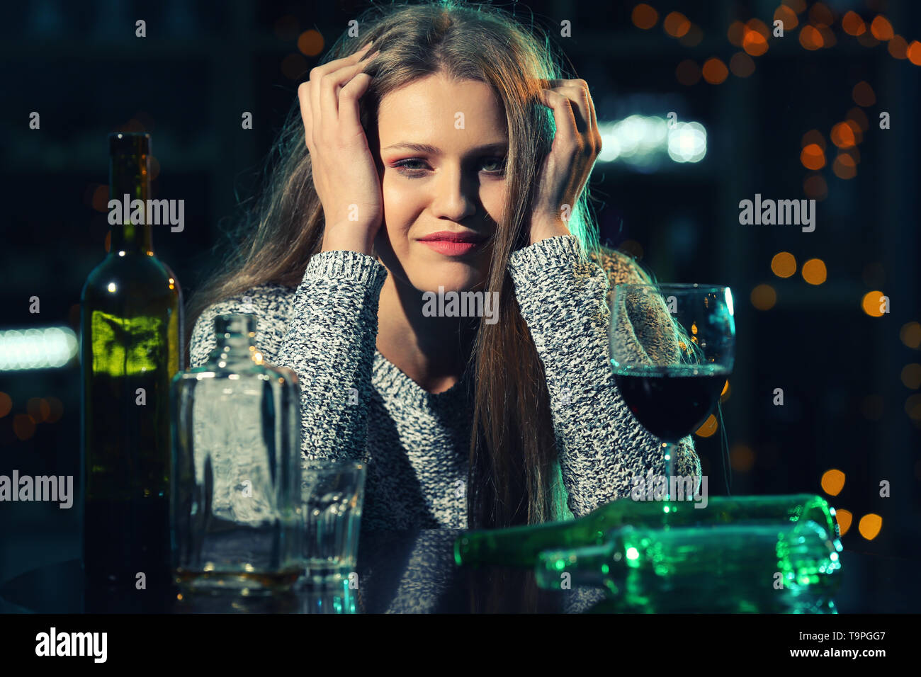 Girl in depression drinking alcohol hi-res stock photography and images ...