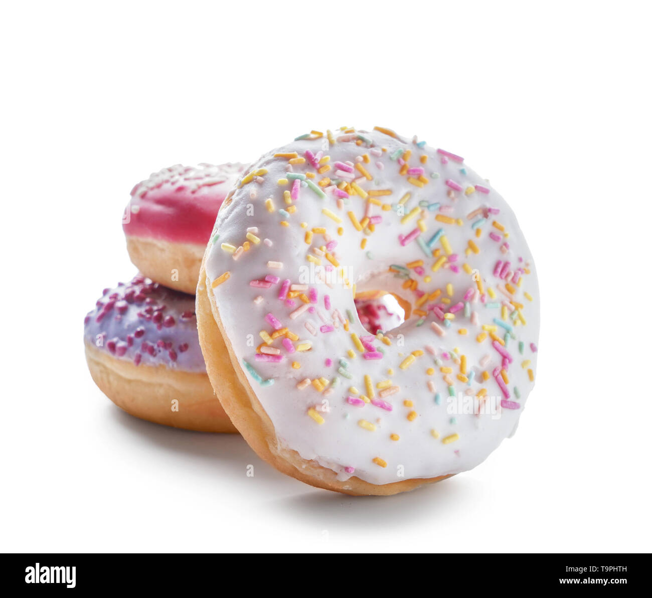 Tasty doughnuts on white background Stock Photo - Alamy
