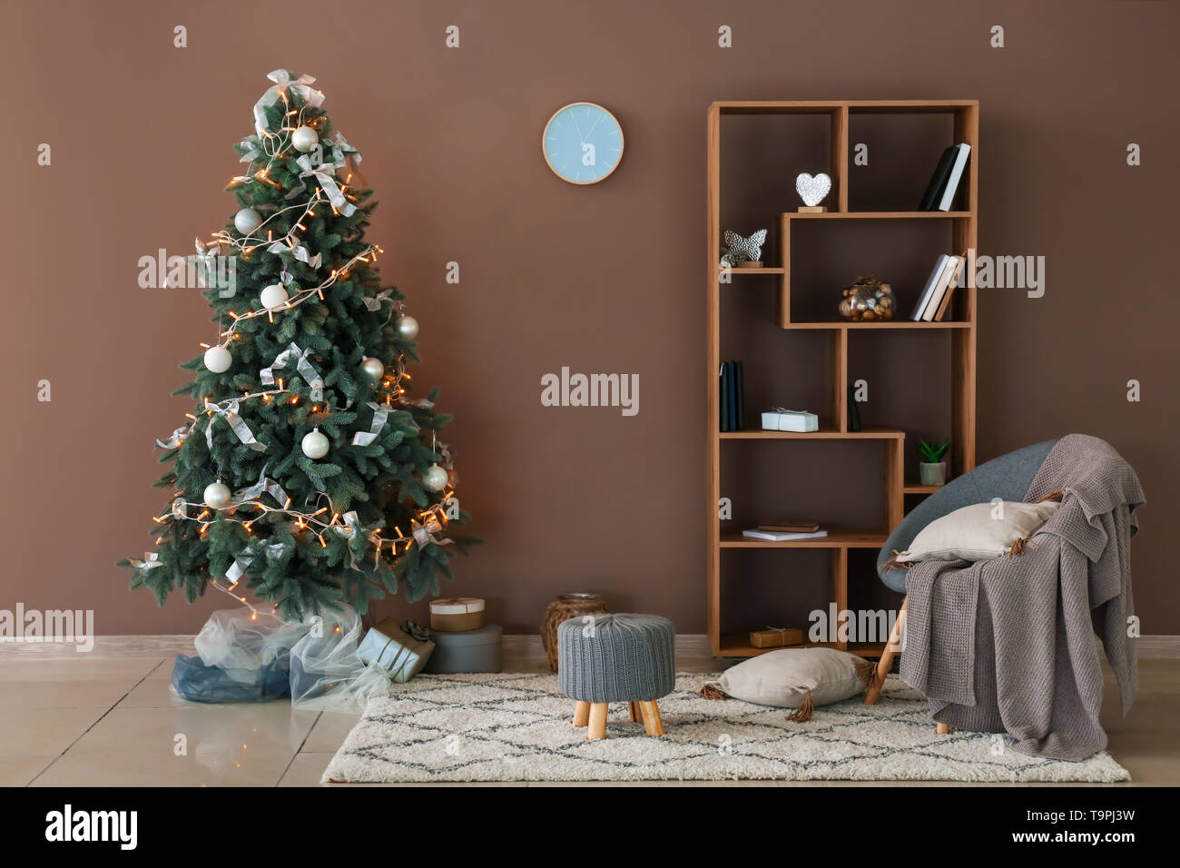 Beautiful fir tree in interior of room Stock Photo - Alamy