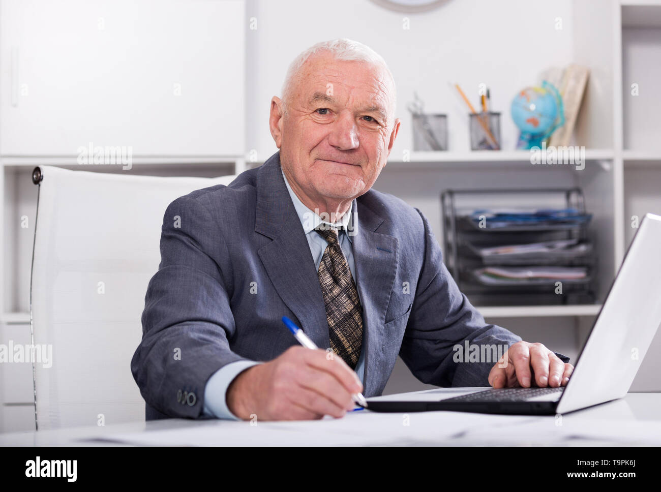 Productive senior employee working hi-res stock photography and images ...