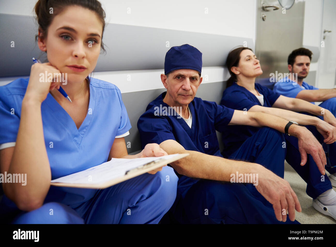 Surgical team tired after operation hi-res stock photography and images ...