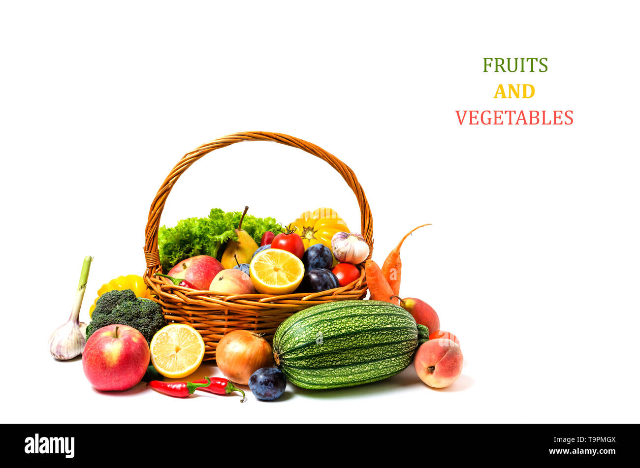 Fruits and vegetables in wicker basket on white background Stock Photo ...