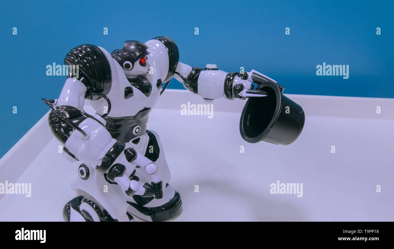 White humanoid robot dancing Stock Photo - Alamy