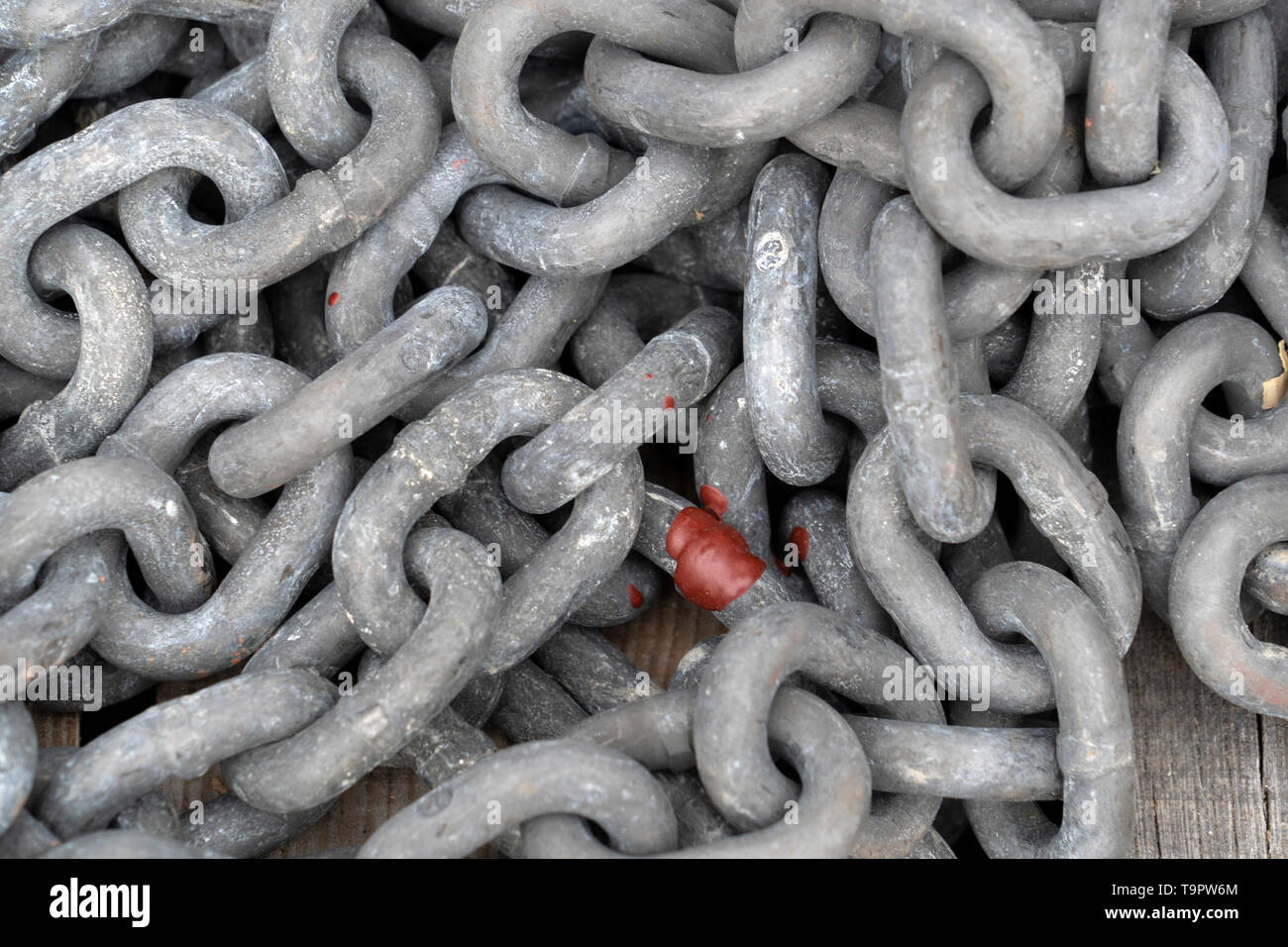 Red blood stained iron chains detail Stock Photo - Alamy