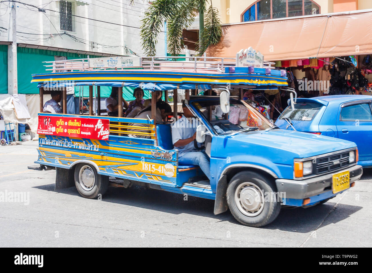 Phuket, Thailand - May 20th 2010: Traditional, blue public bus. This is ...