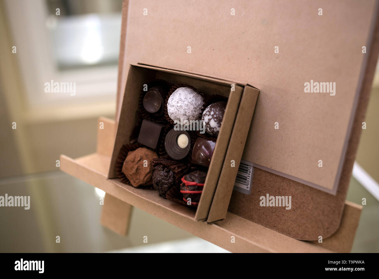 A box of artisan handmade chocolates on a shelf Stock Photo - Alamy