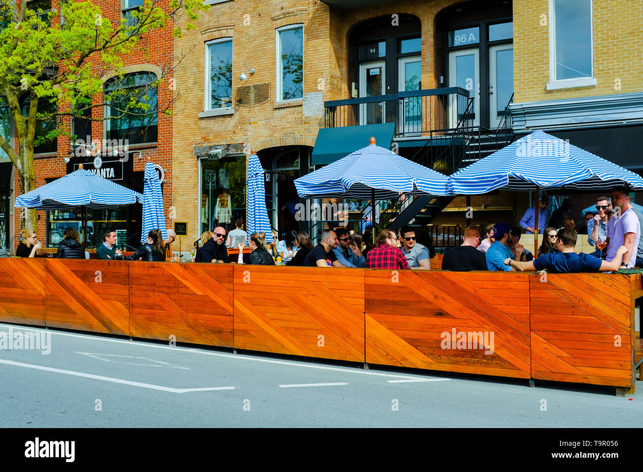 Sidewalk terrace on Laurier street , Montreal Canada Stock Photo - Alamy