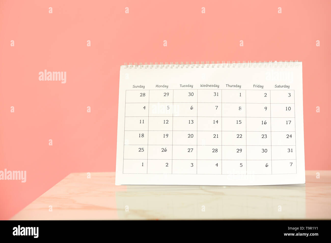Flip calendar on table Stock Photo - Alamy