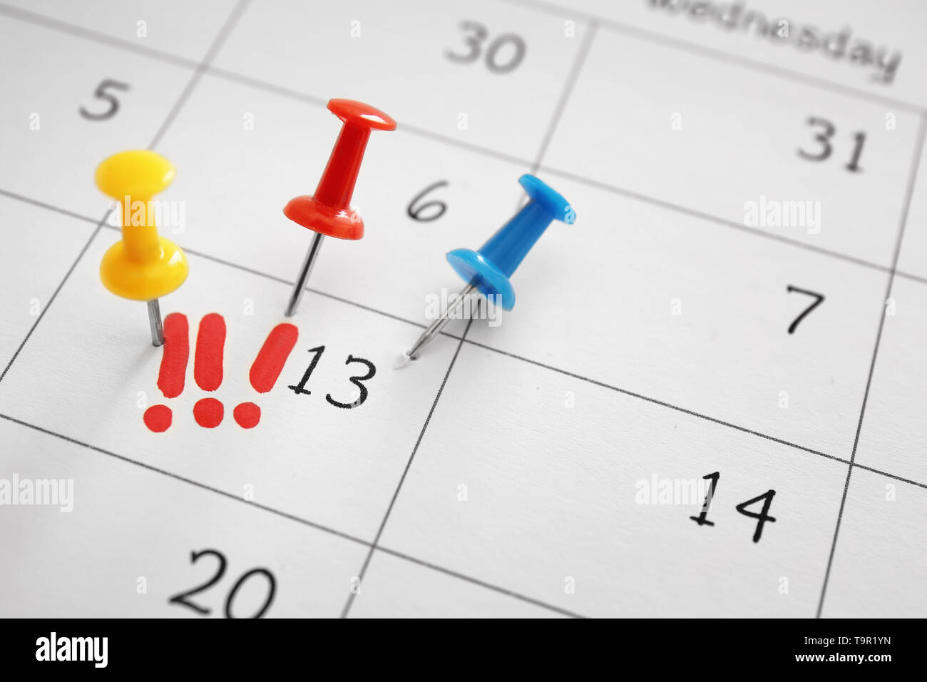 Calendar with pinned date and exclamation marks, closeup Stock Photo ...