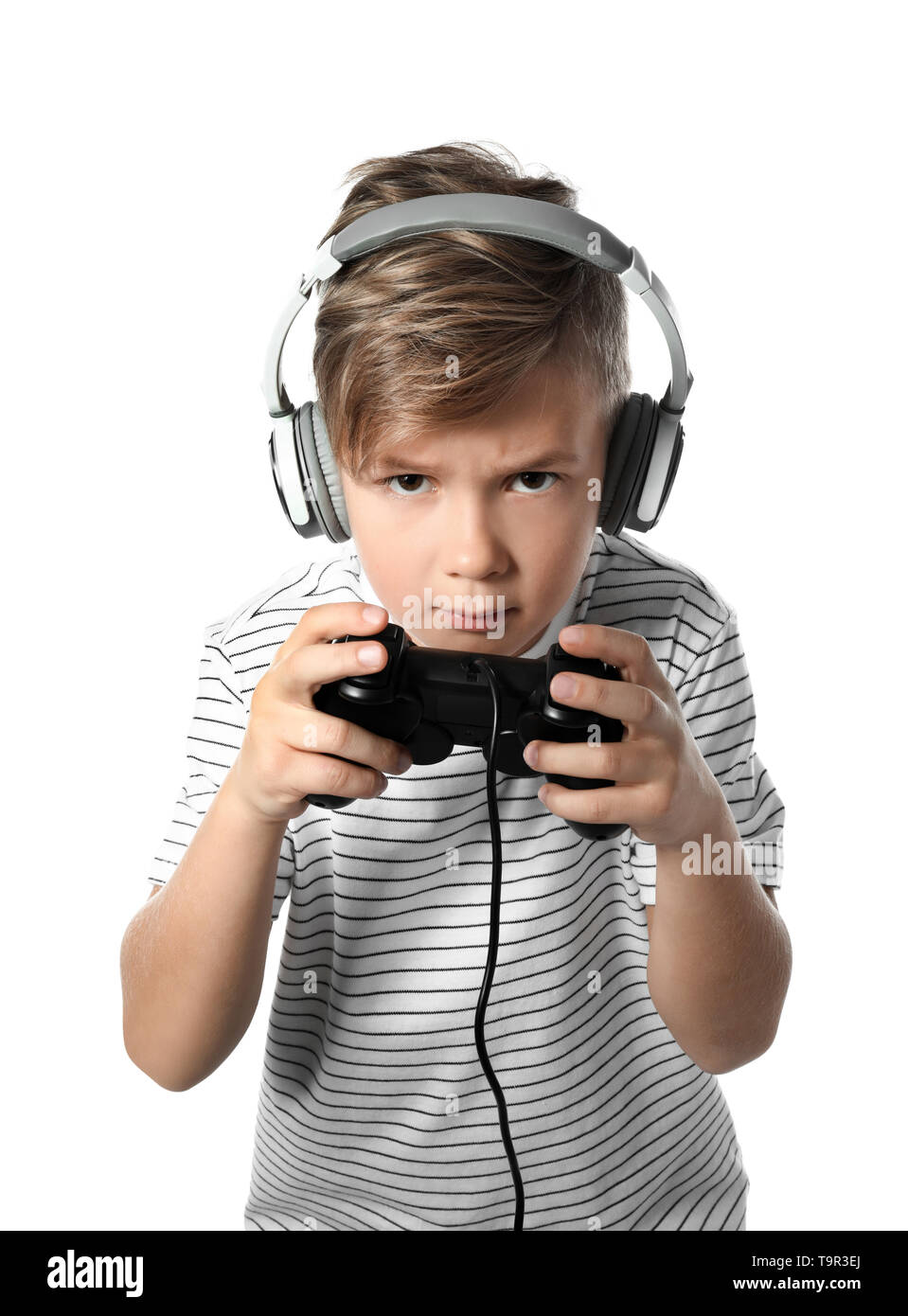 Emotional boy playing video game on white background Stock Photo - Alamy