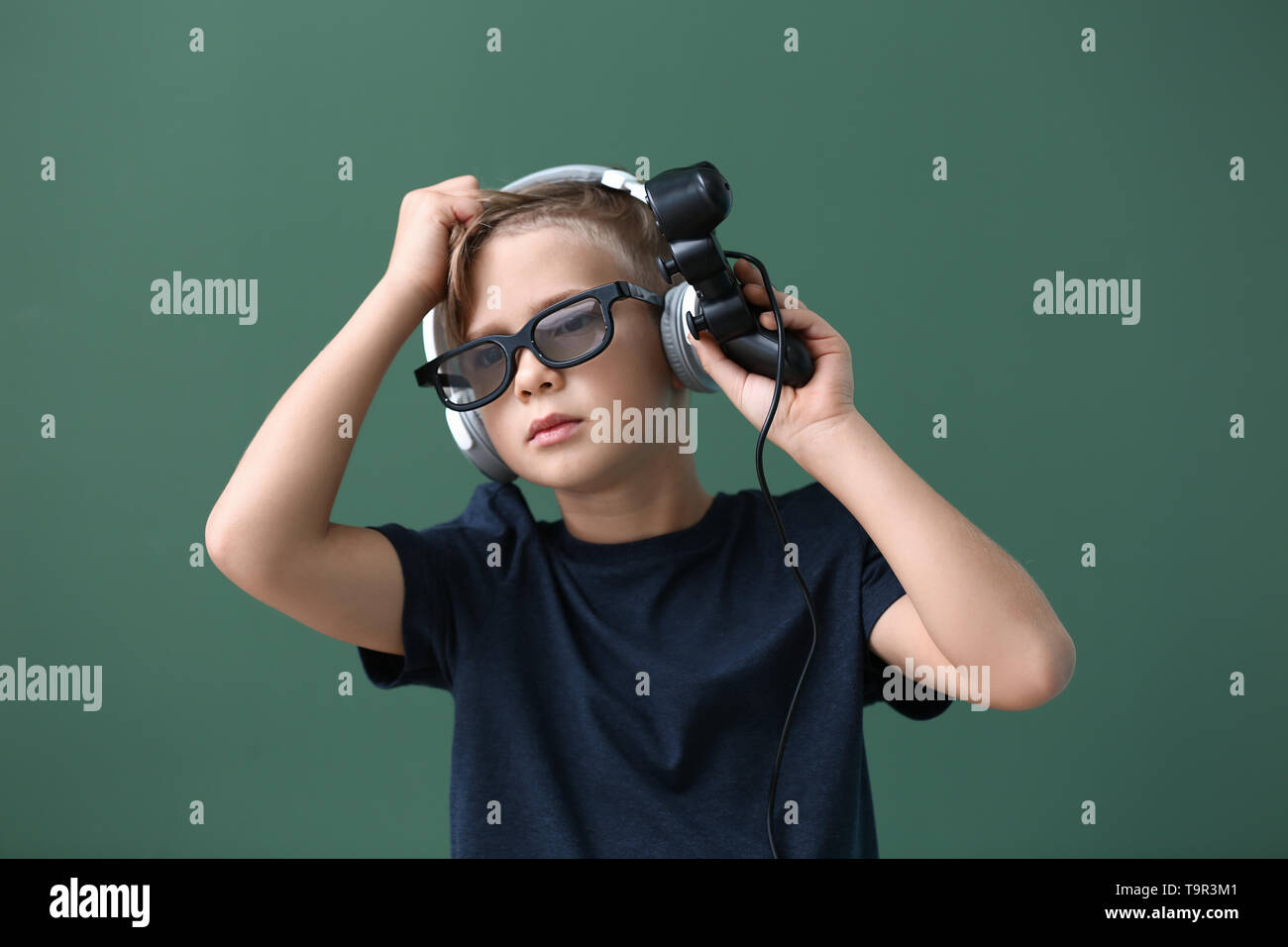 Sad boy after losing video game on color background Stock Photo - Alamy