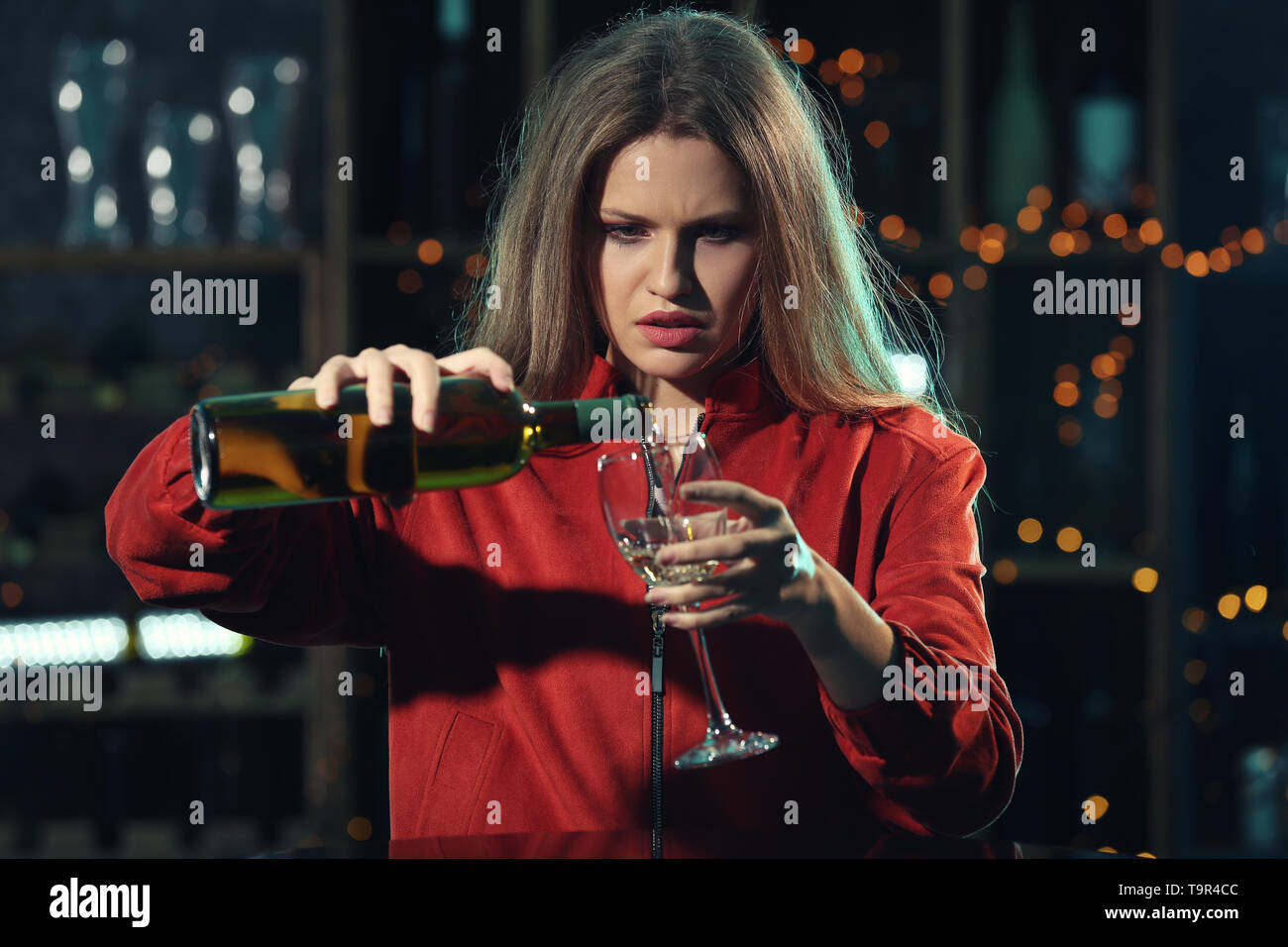 Woman pouring wine pub bar hi-res stock photography and images - Alamy