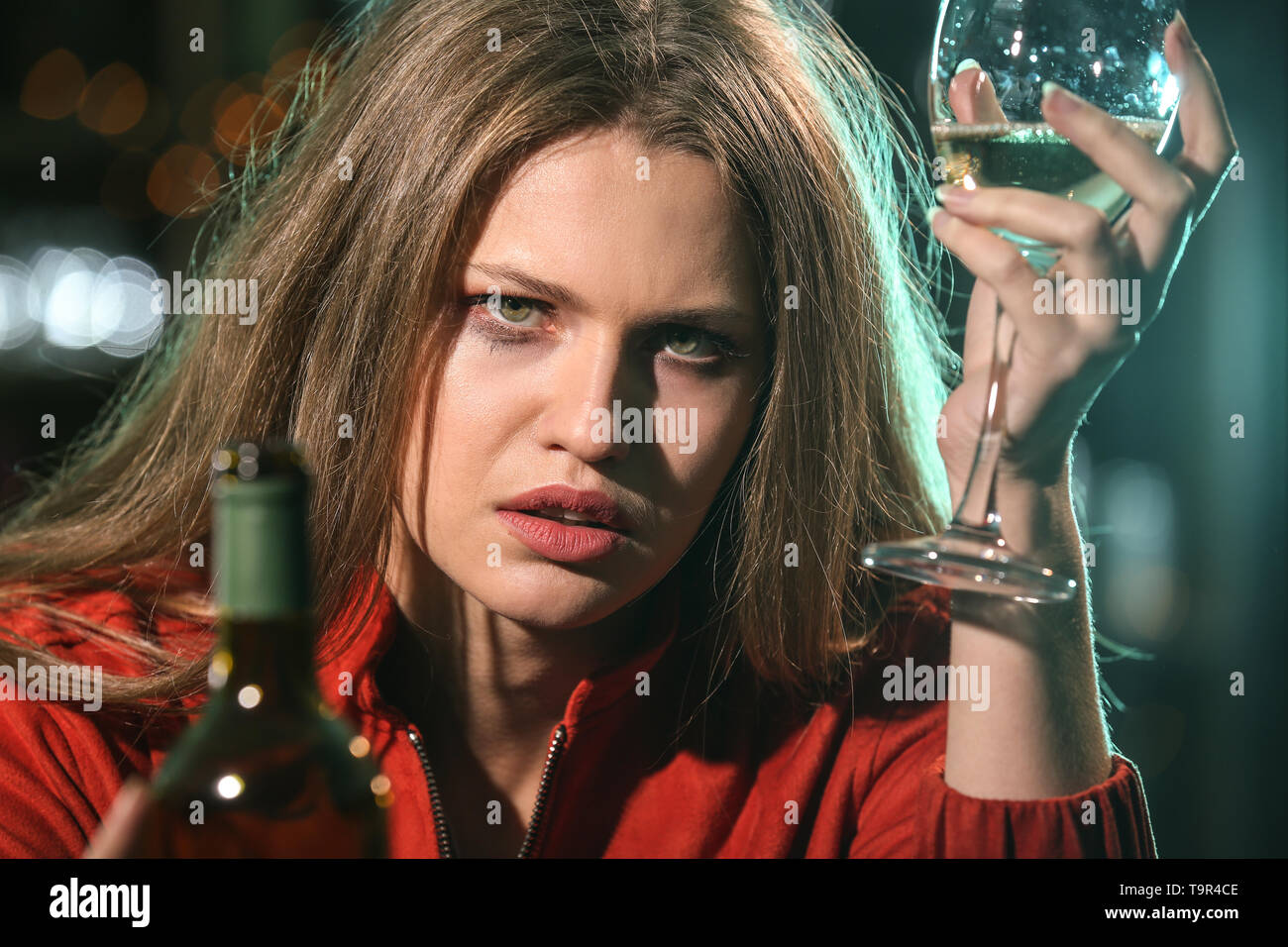 Girl in depression drinking alcohol hi-res stock photography and images ...