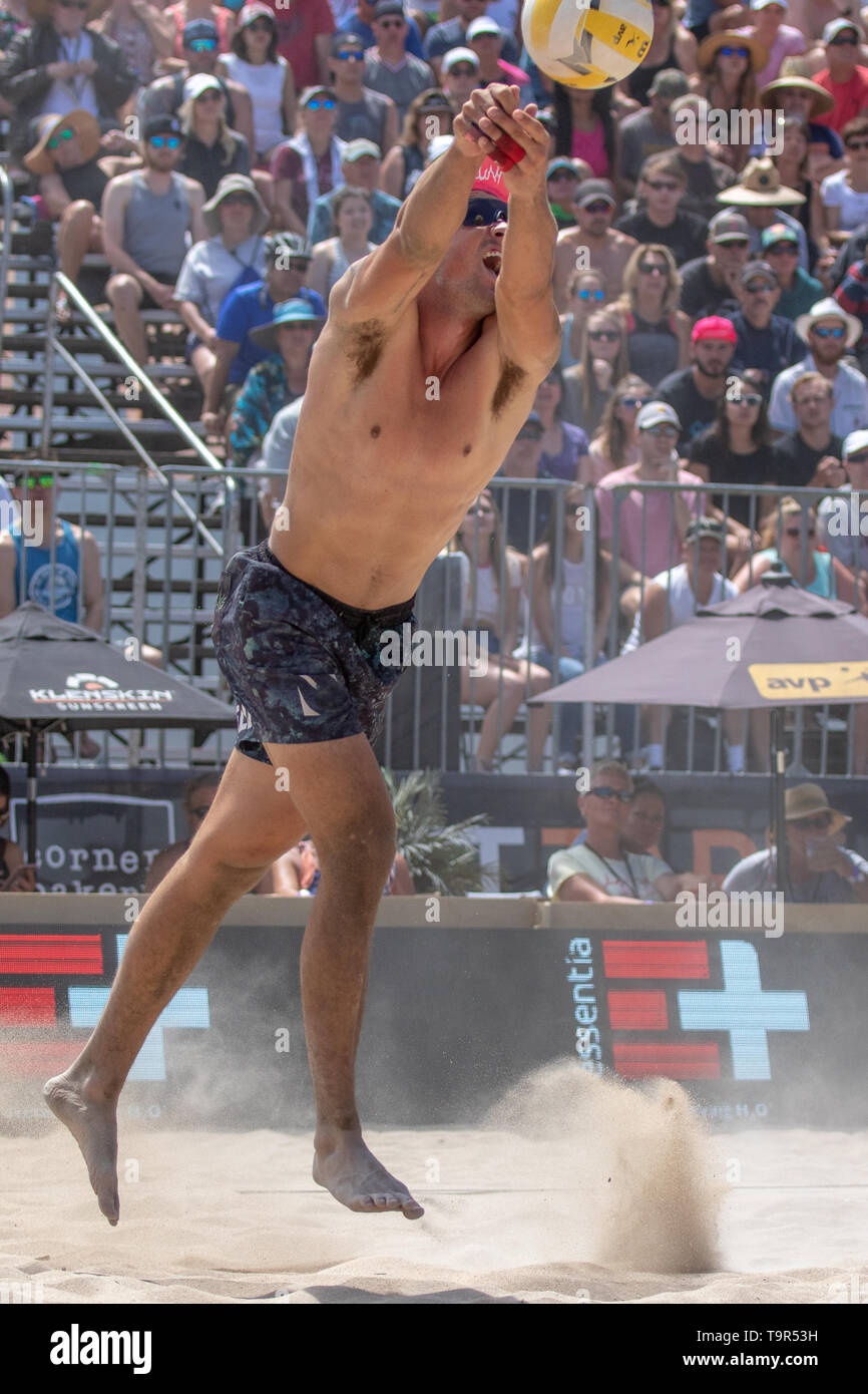 Troy Field passes the ball during semifinal action at the AVP ...