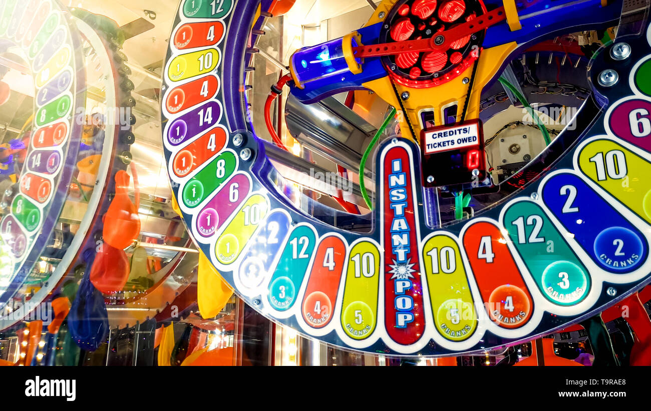 Closeup image of colorful illuminated neon display on the one handed ...