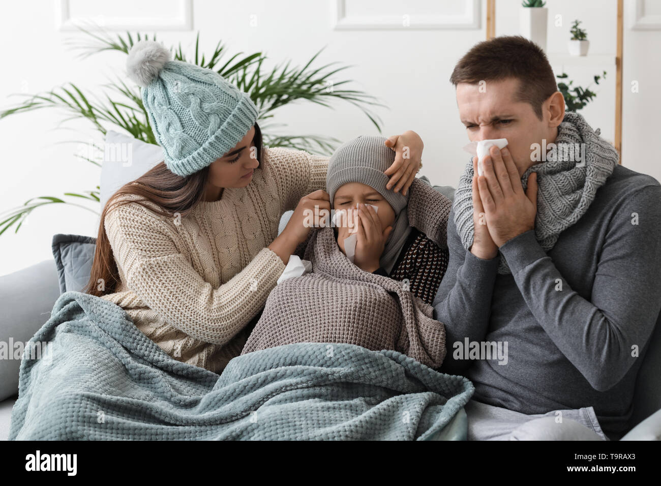 Family ill with flu at home Stock Photo - Alamy