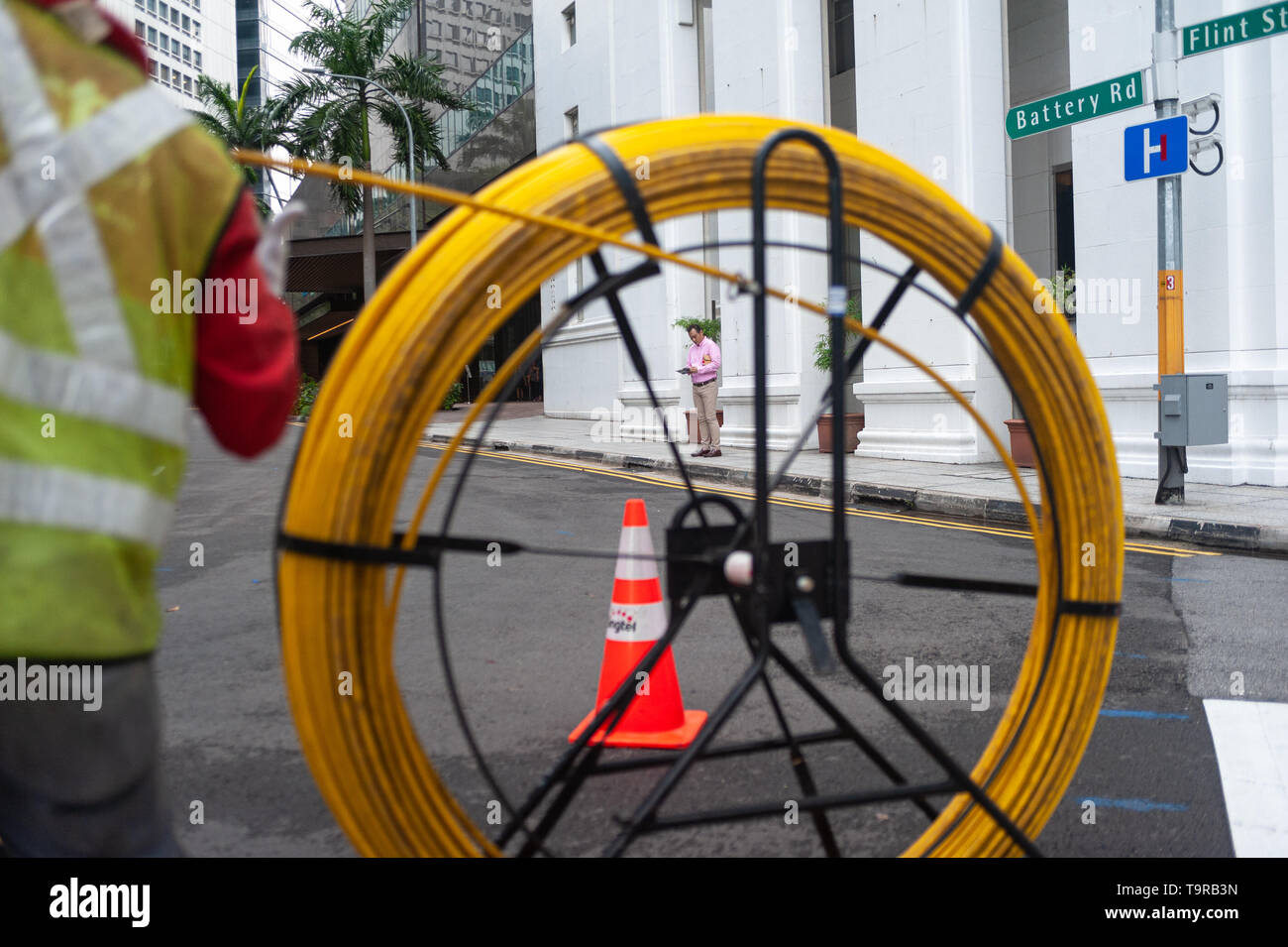 Fibre cable worker road hi-res stock photography and images - Alamy