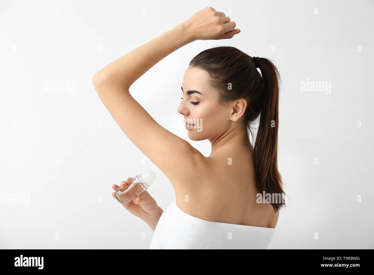 Girl using perfume hi-res stock photography and images - Alamy