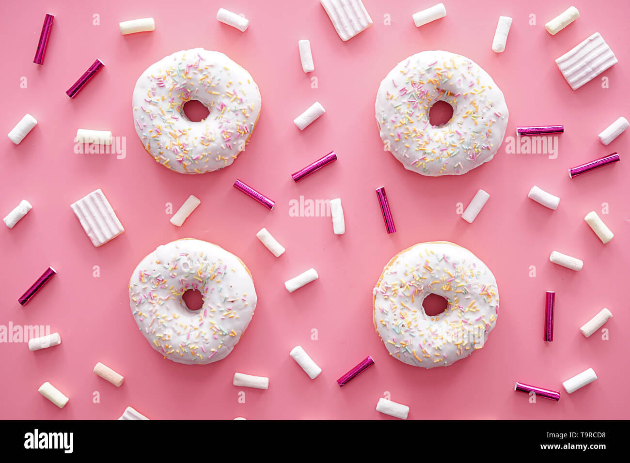 Tasty donuts and sweets on color background Stock Photo - Alamy
