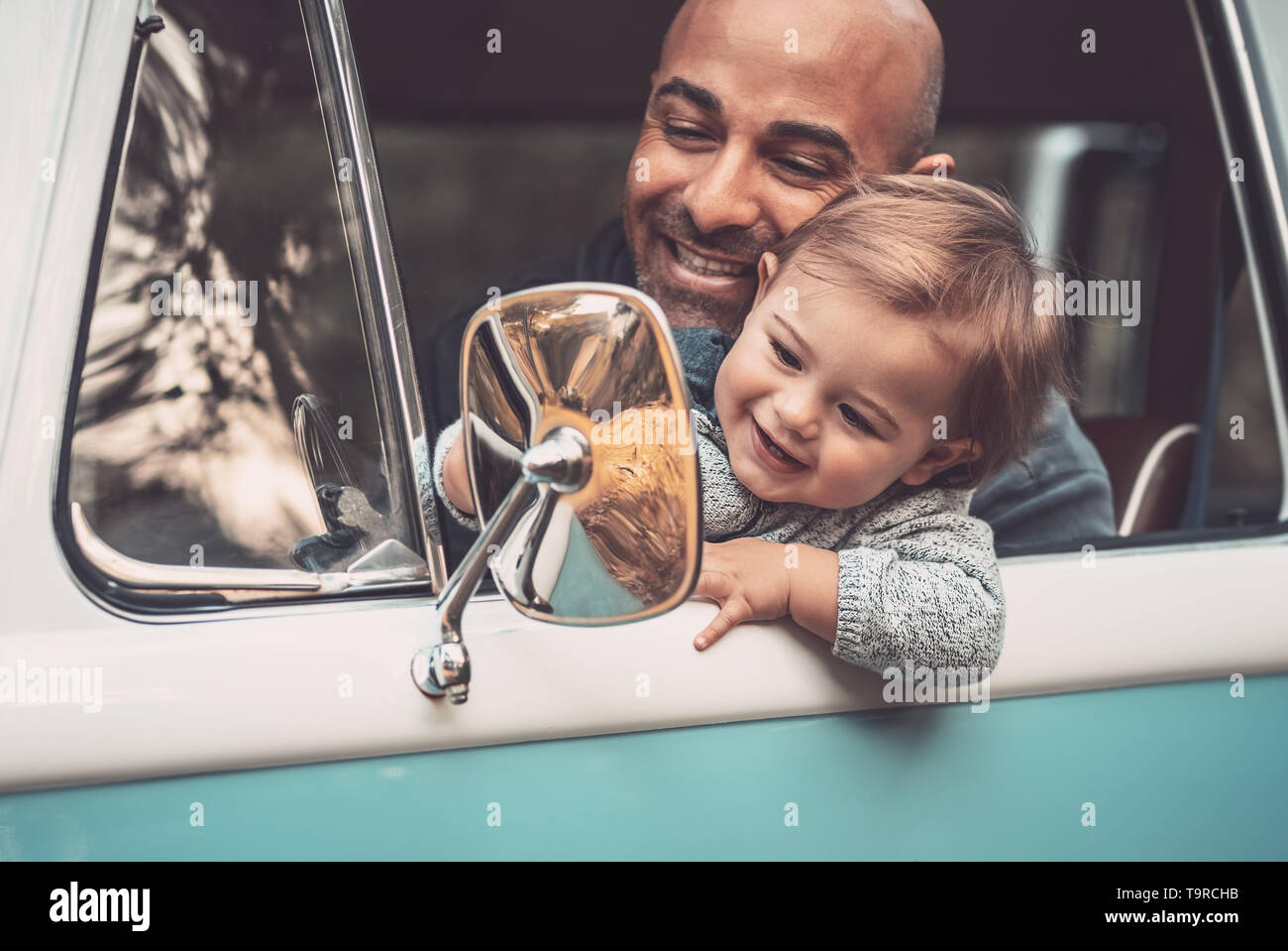 Father teaching son to drive car hi-res stock photography and images ...