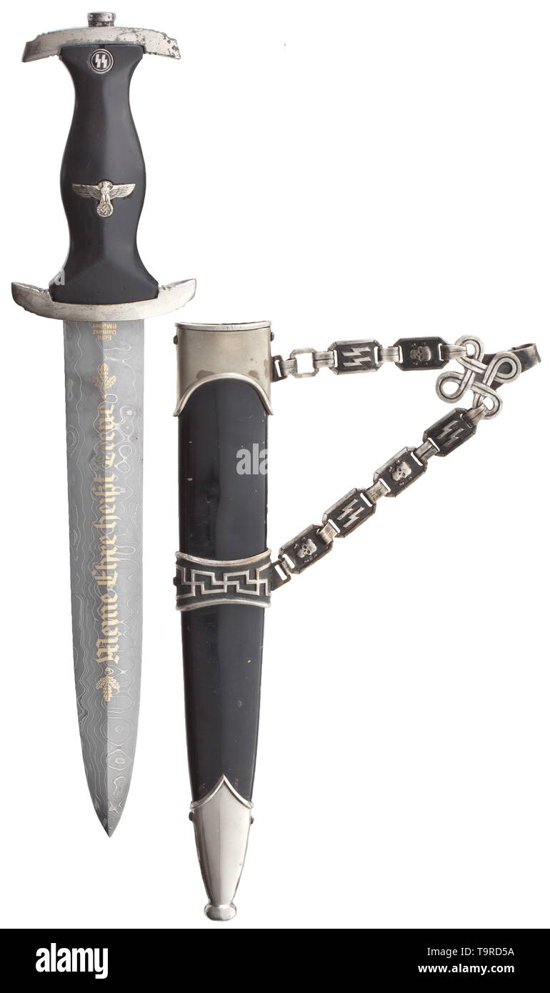 An SS service dagger M 36 Etched Damascus blade with gilt motto, on the ...