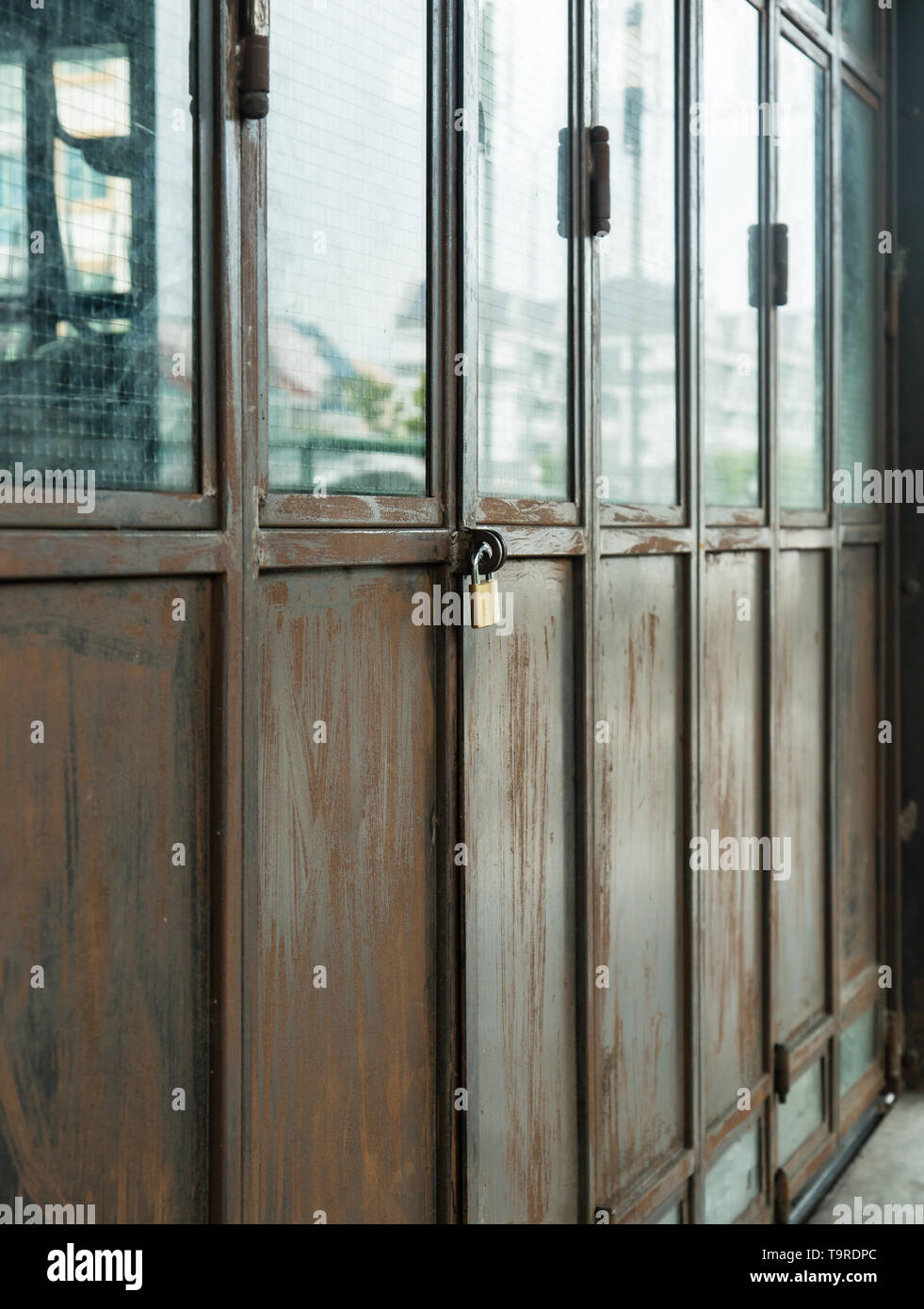 metal door vintage glass reflection Stock Photo - Alamy
