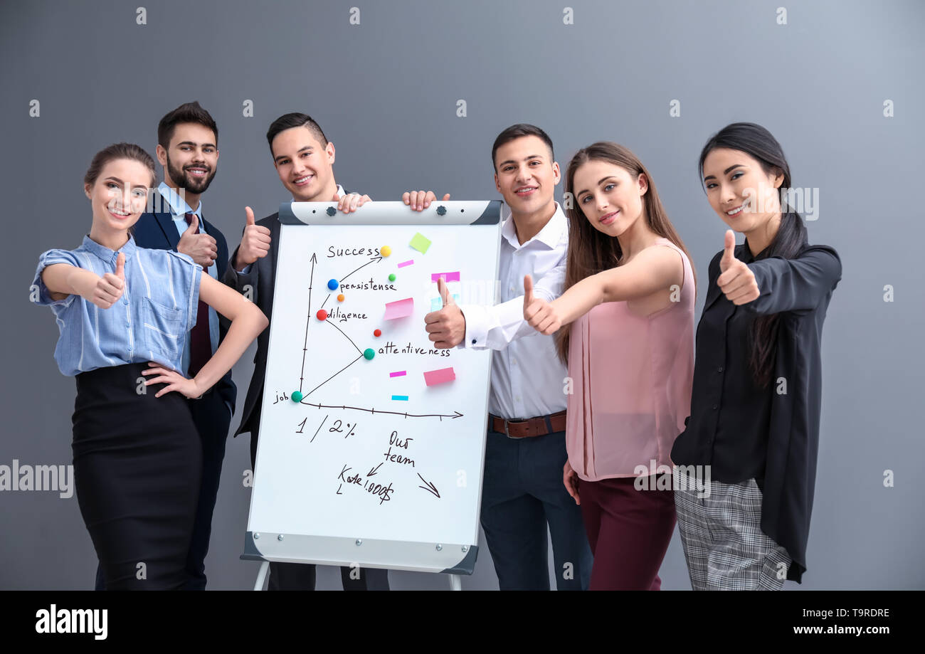 Team planning work drawing flipchart hi-res stock photography and ...