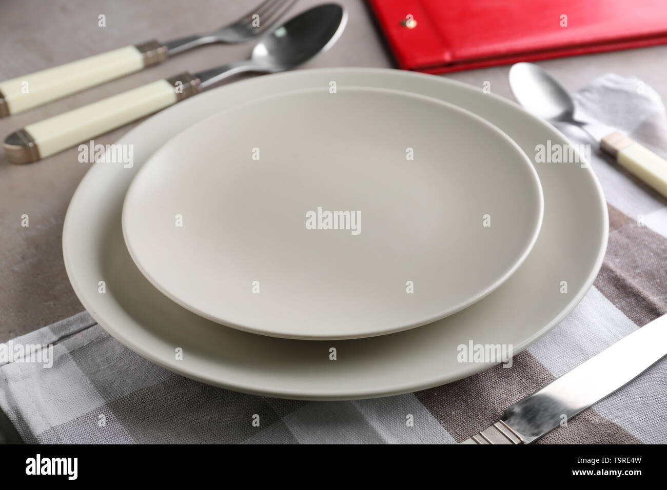 Served table in restaurant Stock Photo - Alamy