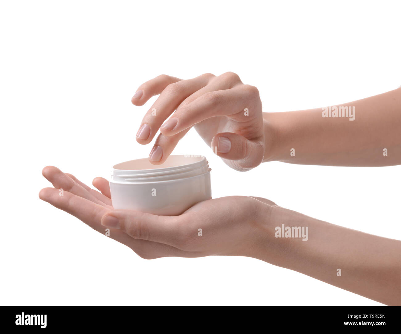 Female hands with jar of cream on white background Stock Photo - Alamy