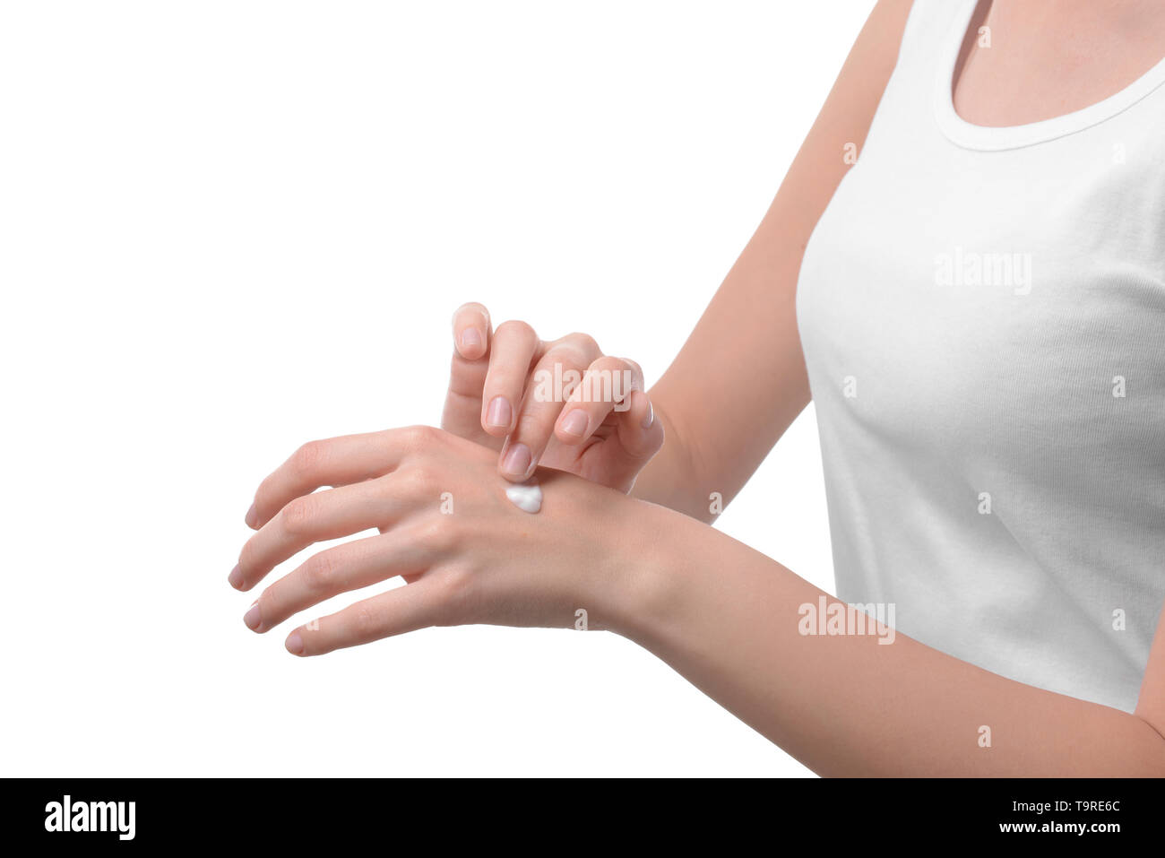 Woman applying hand cream on white background, closeup Stock Photo - Alamy