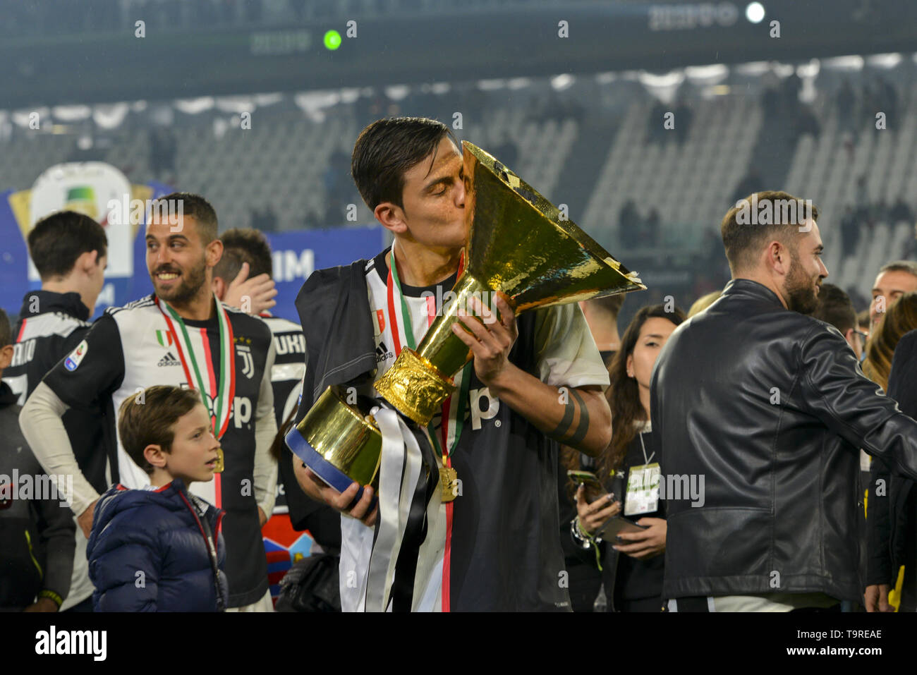 Paulo Dybala of Juventus FC lints the trophy of Scudetto 2018-2019 at ...