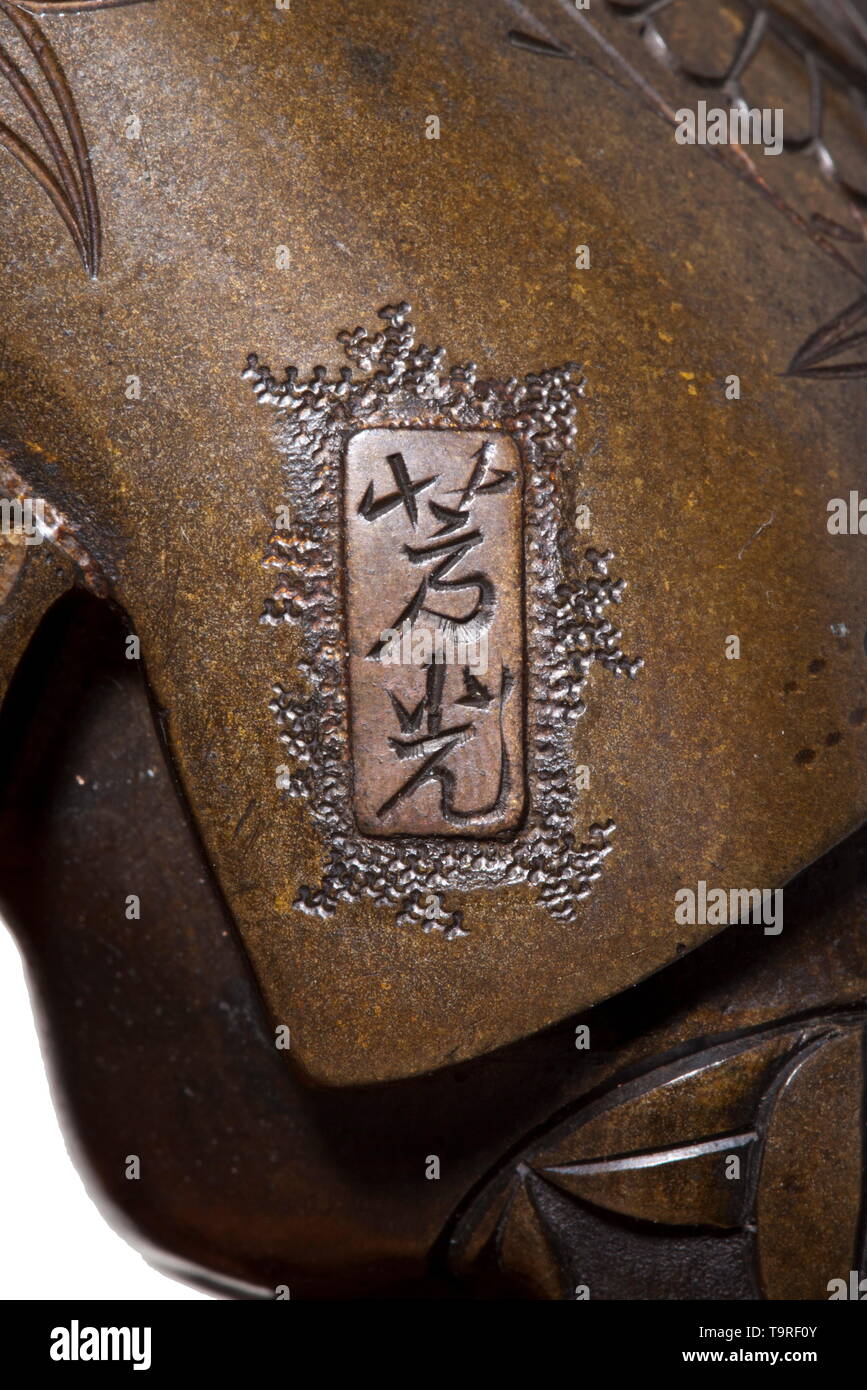 A Japanese figure of a fighting samurai with naginata, Meiji period ...