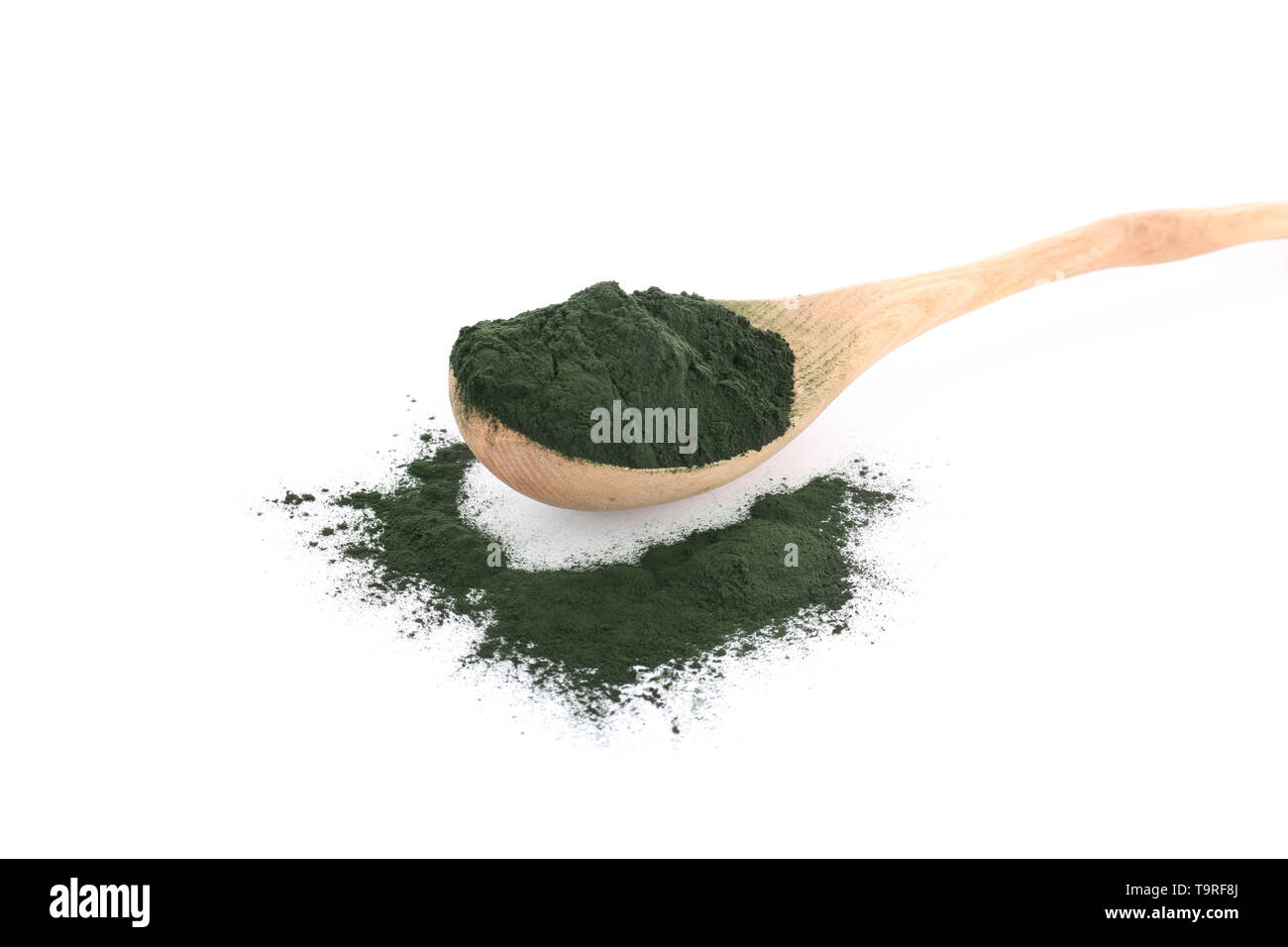 Spoon with spirulina powder on white background Stock Photo - Alamy
