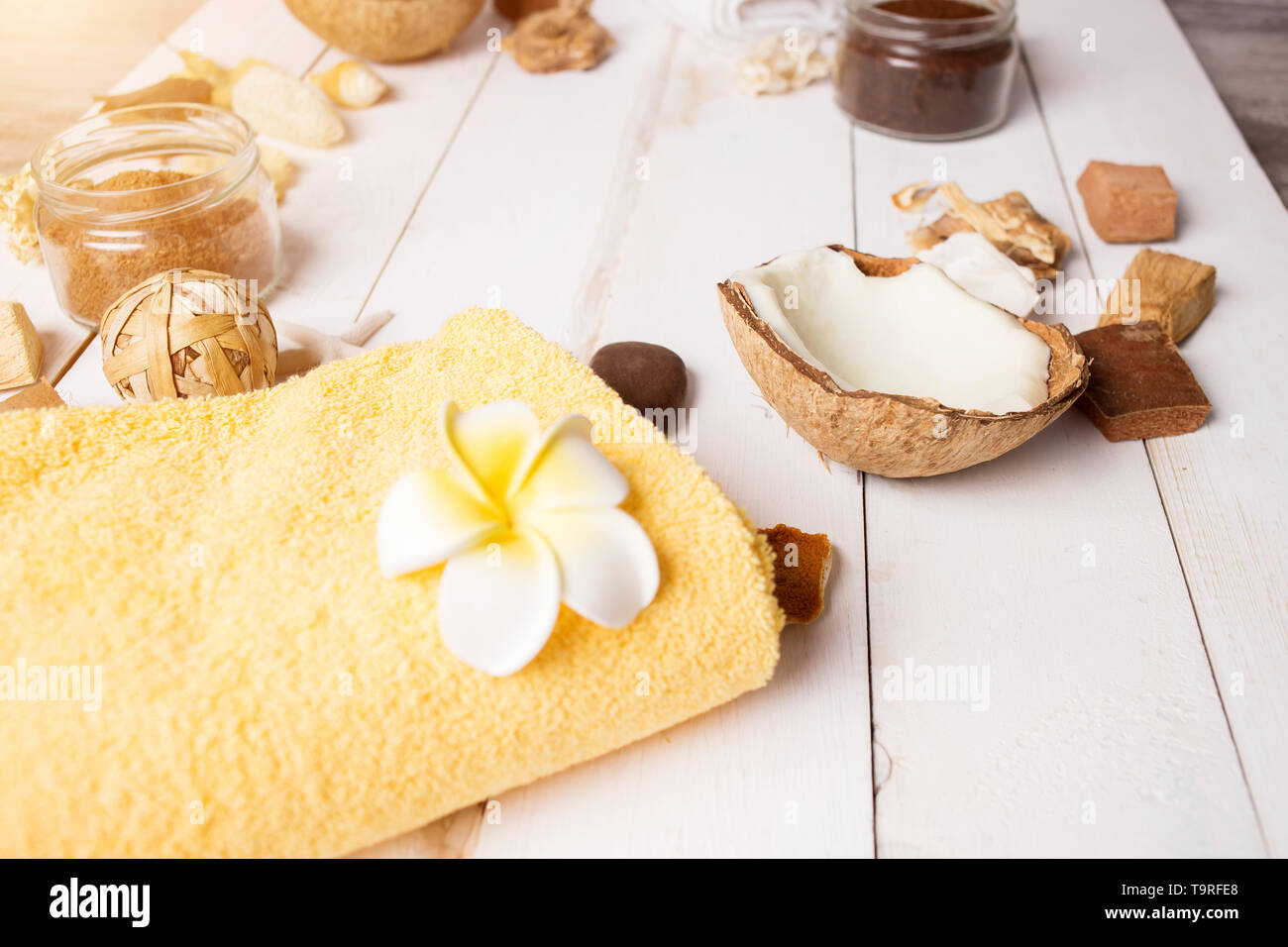 Coconut fruit and spa accessories with natural coffee scrub, white and ...