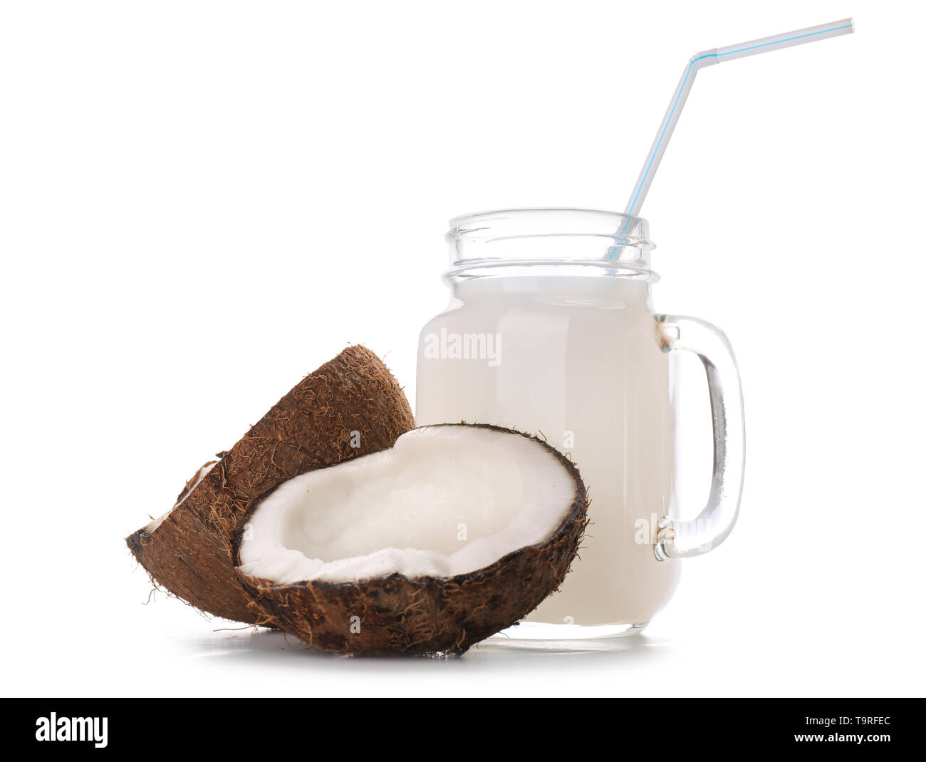 Mason jar of coconut water on white background Stock Photo - Alamy