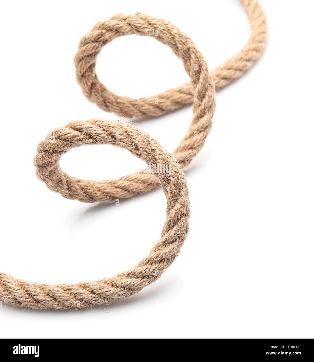 Rope on white background Stock Photo - Alamy