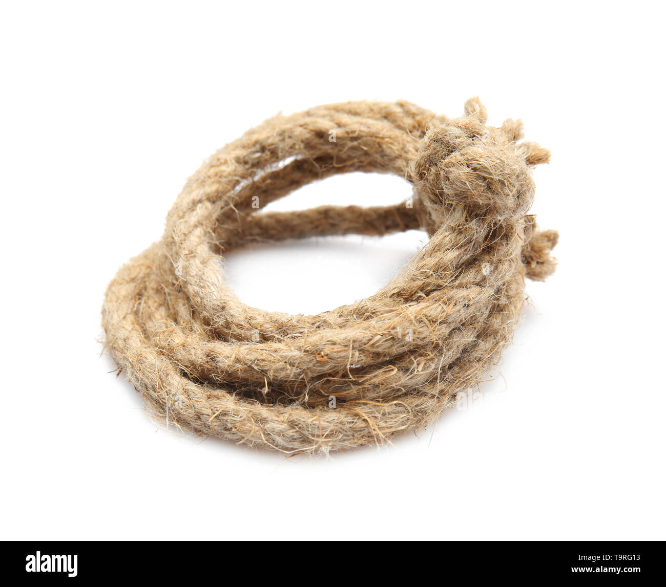 Rolled rope on white background Stock Photo - Alamy