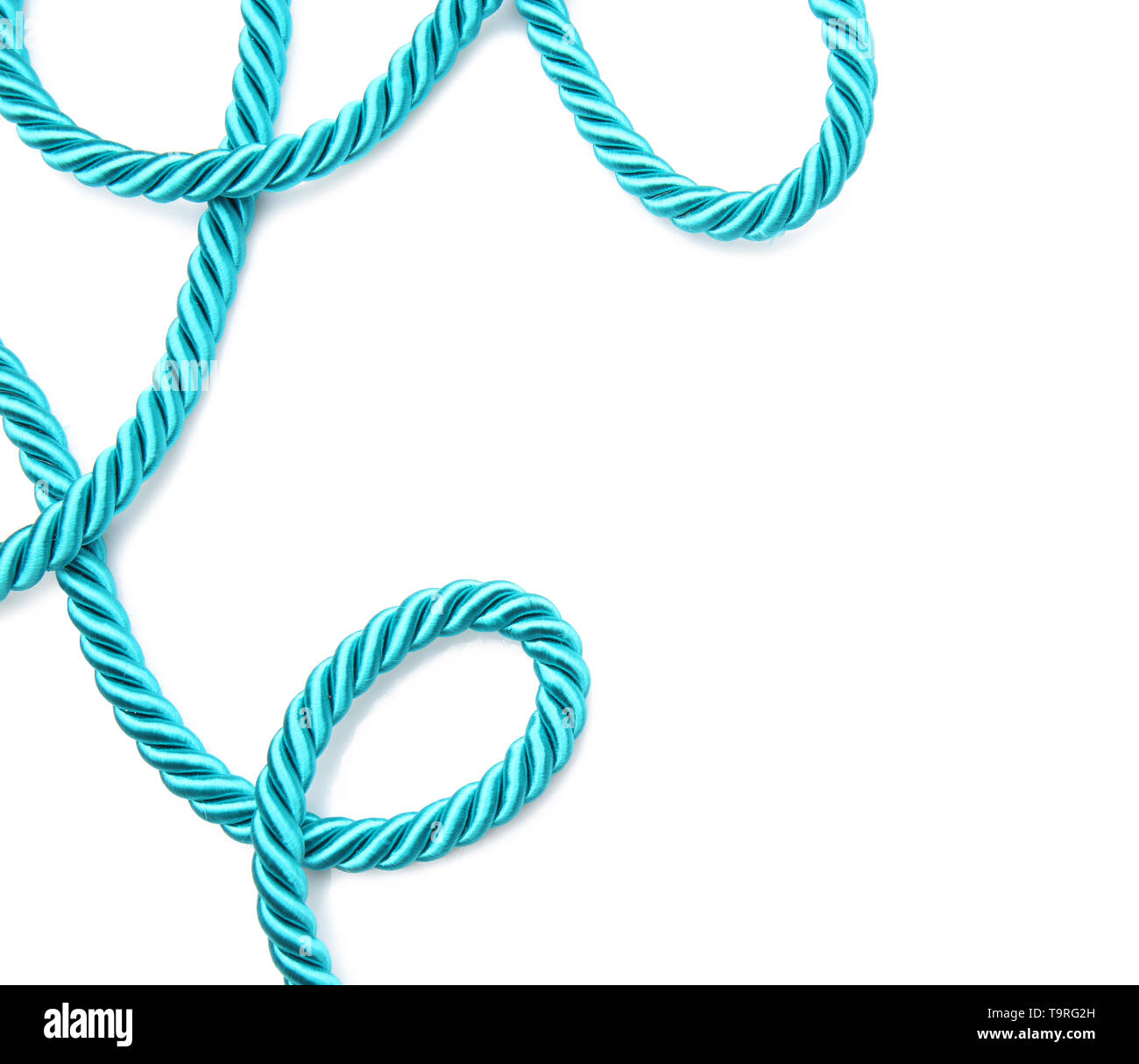 Rope on white background Stock Photo - Alamy