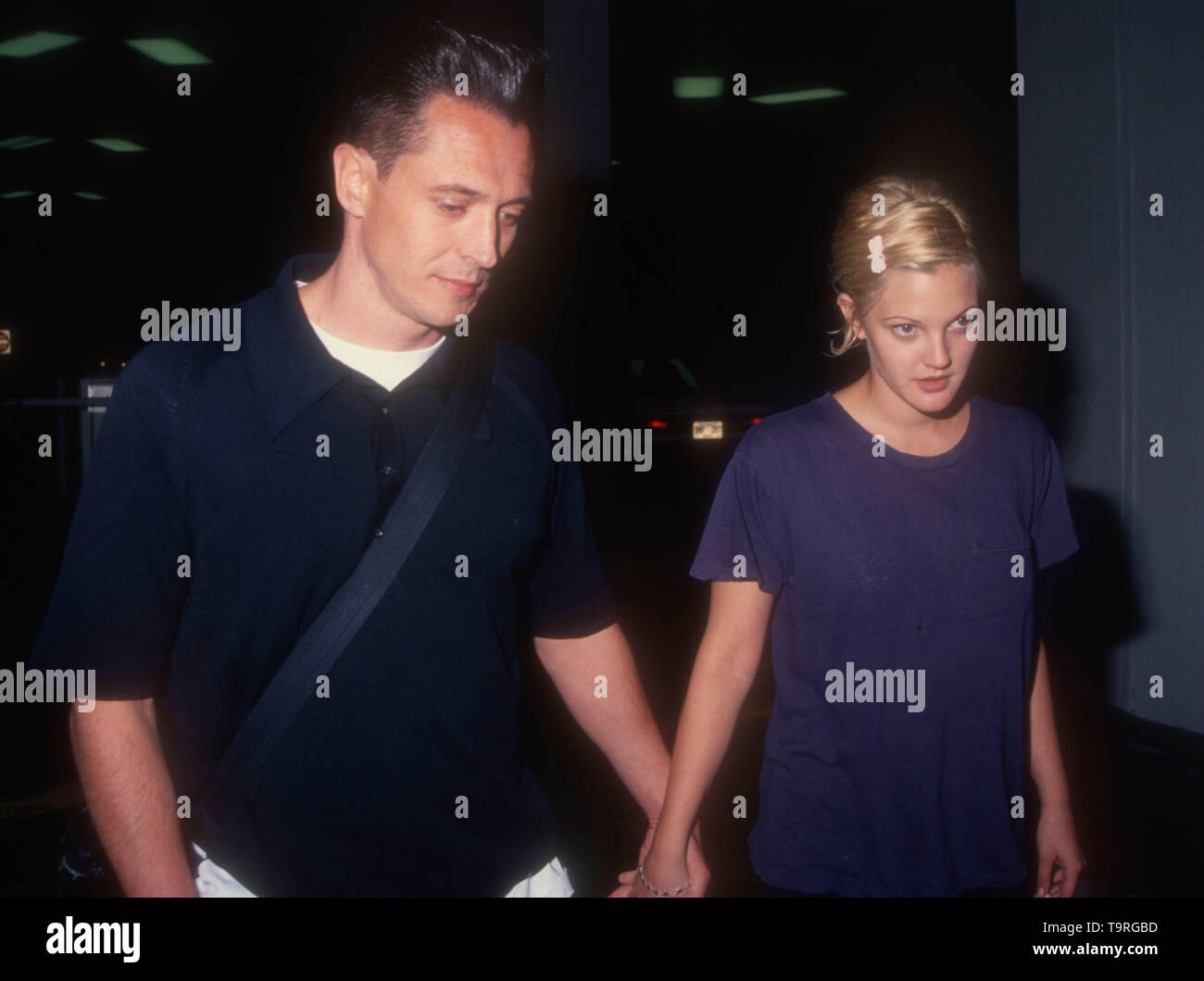 Jeremy thomas and drew barrymore hi-res stock photography and images ...