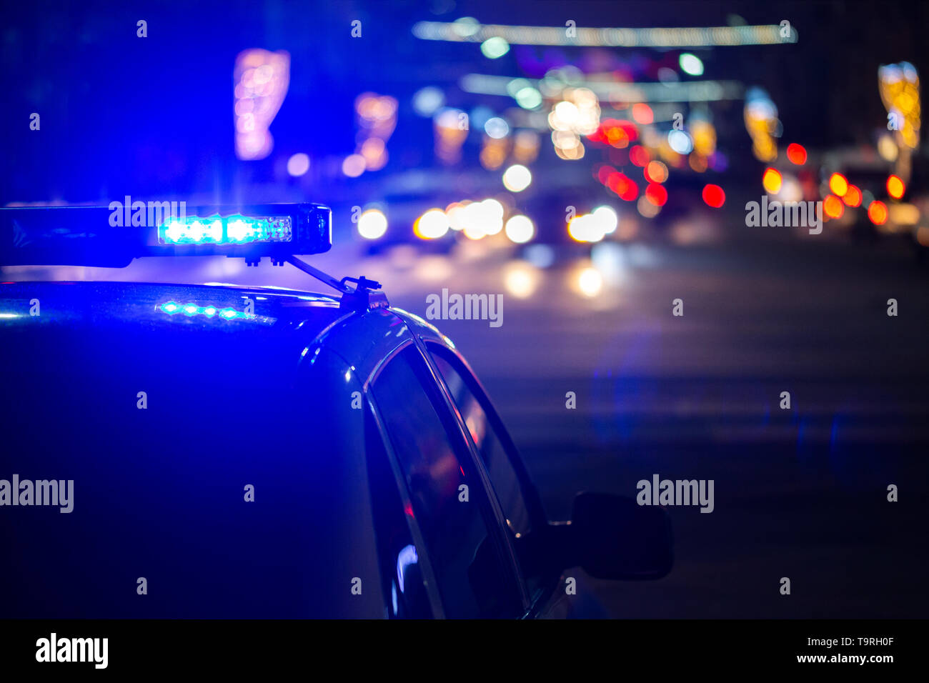 Flashing police lights in blur hi-res stock photography and images - Alamy