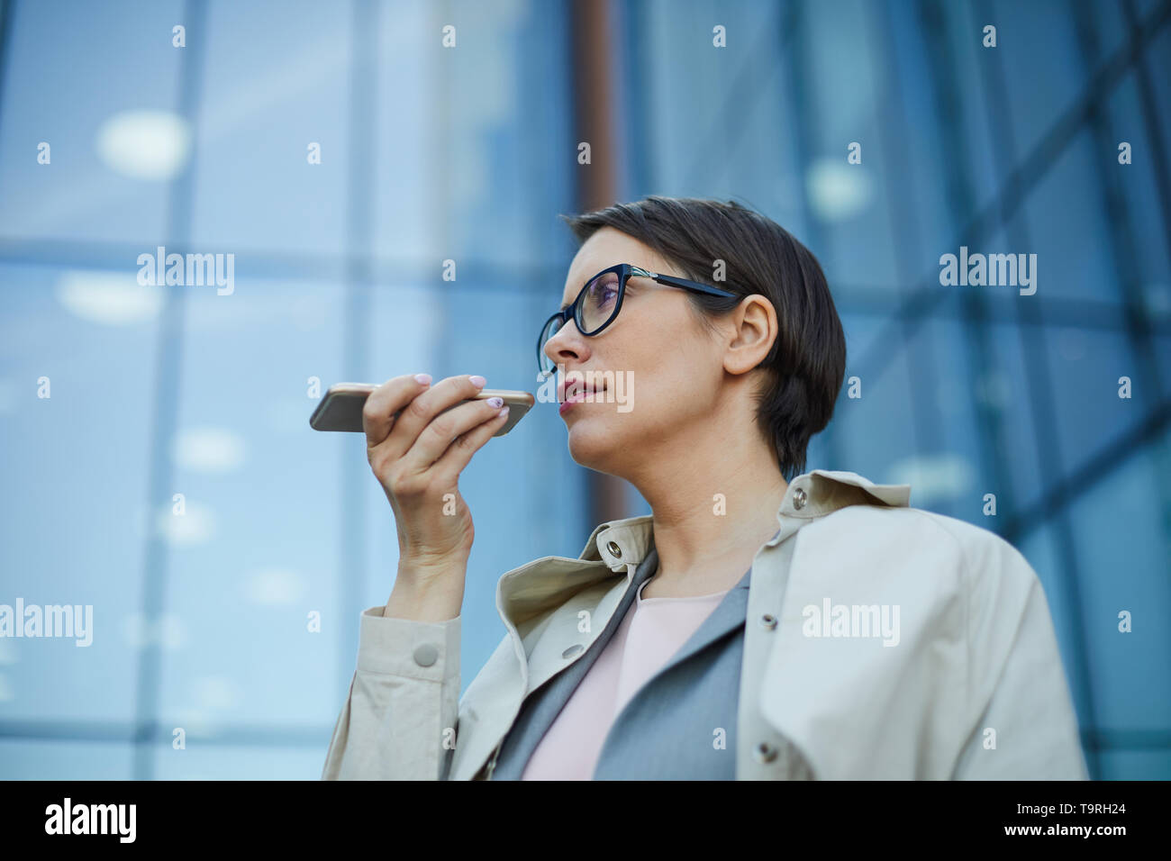 Person recording conversation hi-res stock photography and images - Alamy