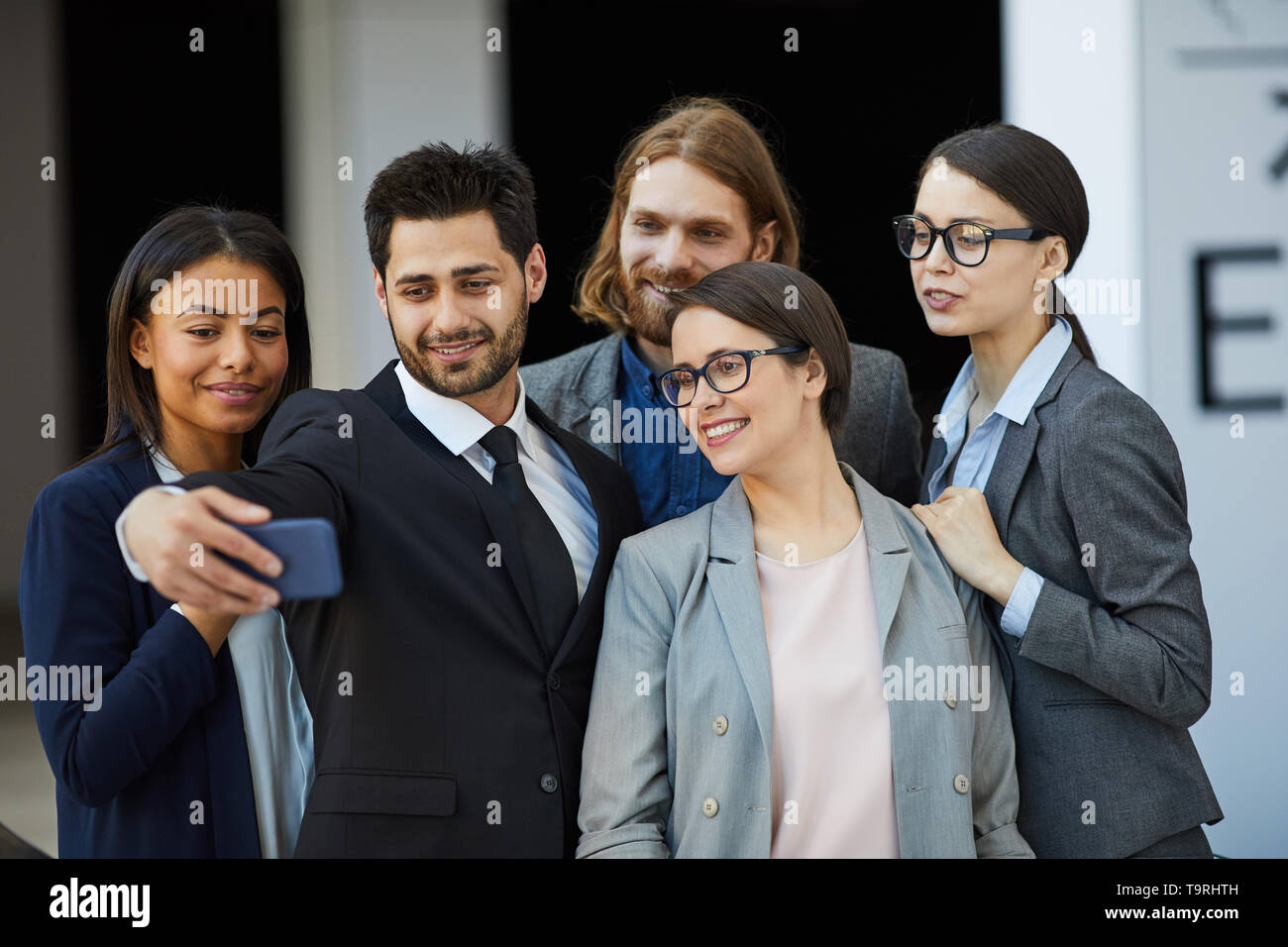 Group selfie of business team Stock Photo - Alamy