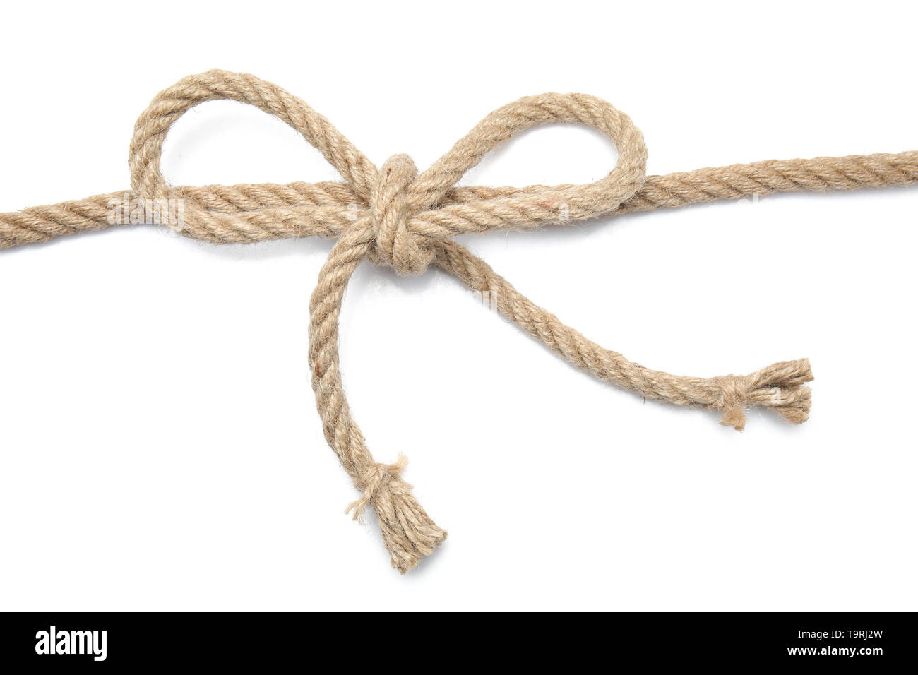 Rope with bow on white background Stock Photo - Alamy