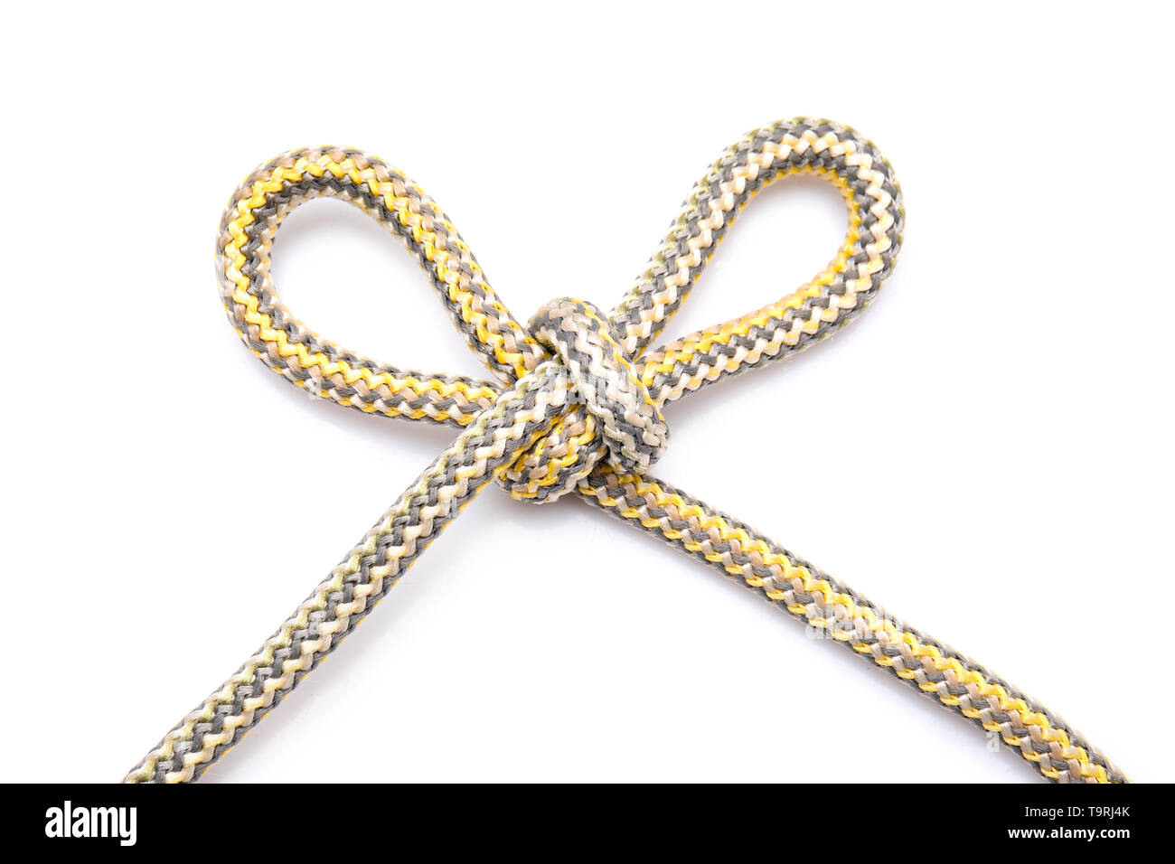 Rope with bow on white background Stock Photo - Alamy